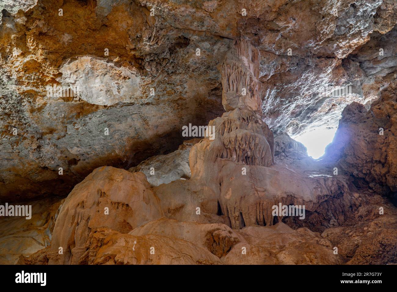 An awe-inspiring interior of a natural cave featuring an impressive ...