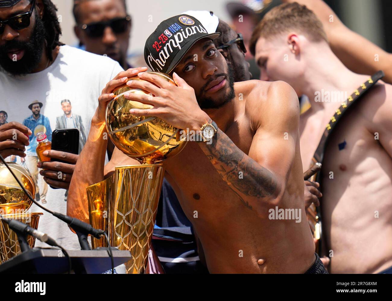 Denver Nuggets forward Bruce Brown hugs the championship trophy during ...