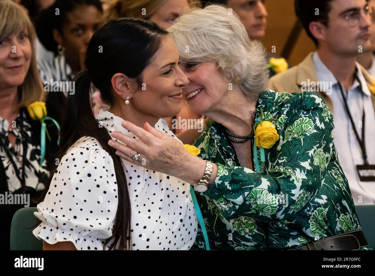 Diana Parkes, mother to Joanna Simpson, and Dame Priti Patel embrace ...