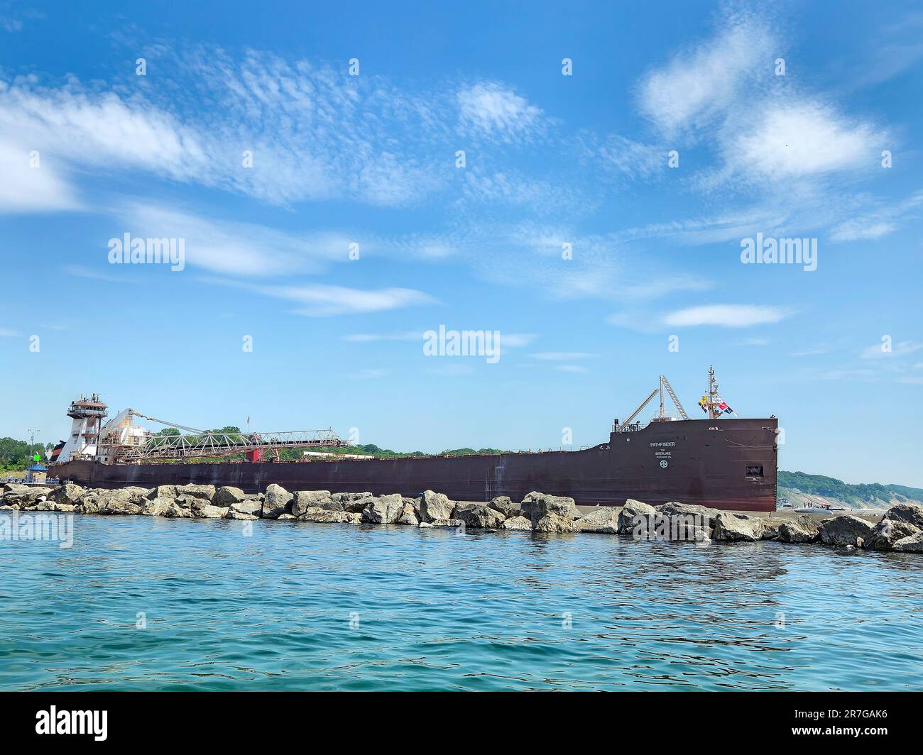 Pathfinder barge and Dorothy Ann tugboat leaving Holland Michigan Stock ...