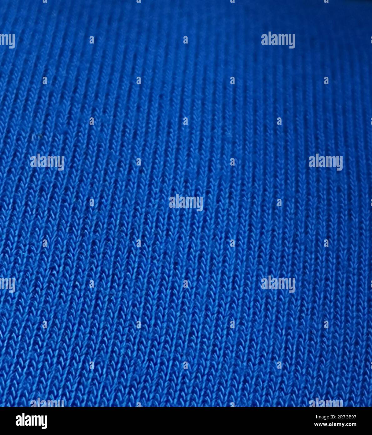 Deep blue machine knitted fabric background with space for copy Stock ...