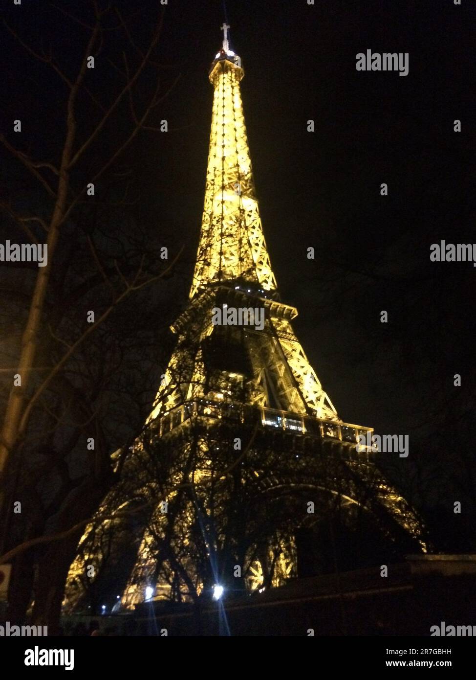 Eiffel Tower beautifully lit up at night, in Paris, France Stock Photo ...
