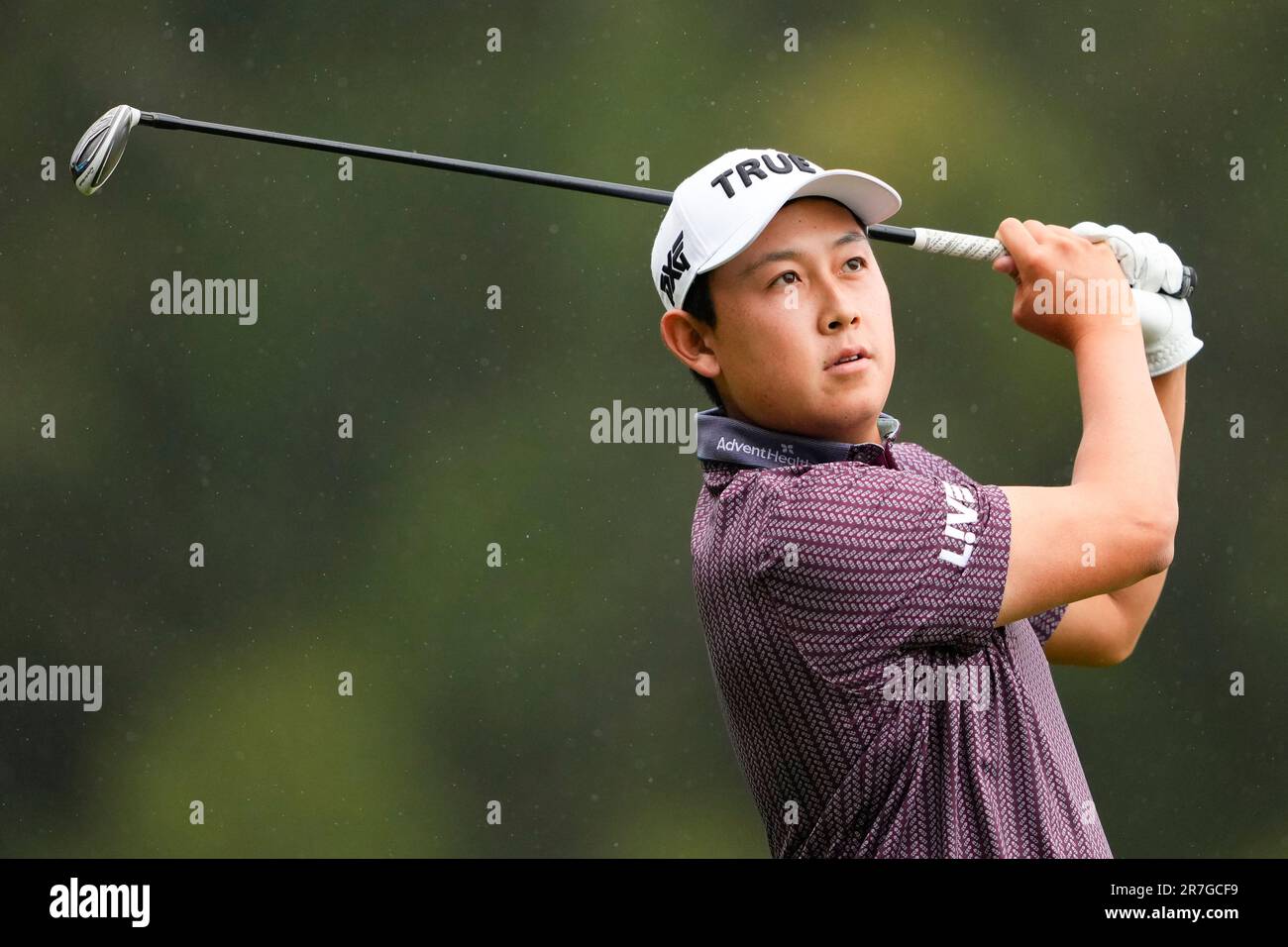 Dylan Wu watches his tee shot on the seventh hole during the first round of the U.S. Open golf ...