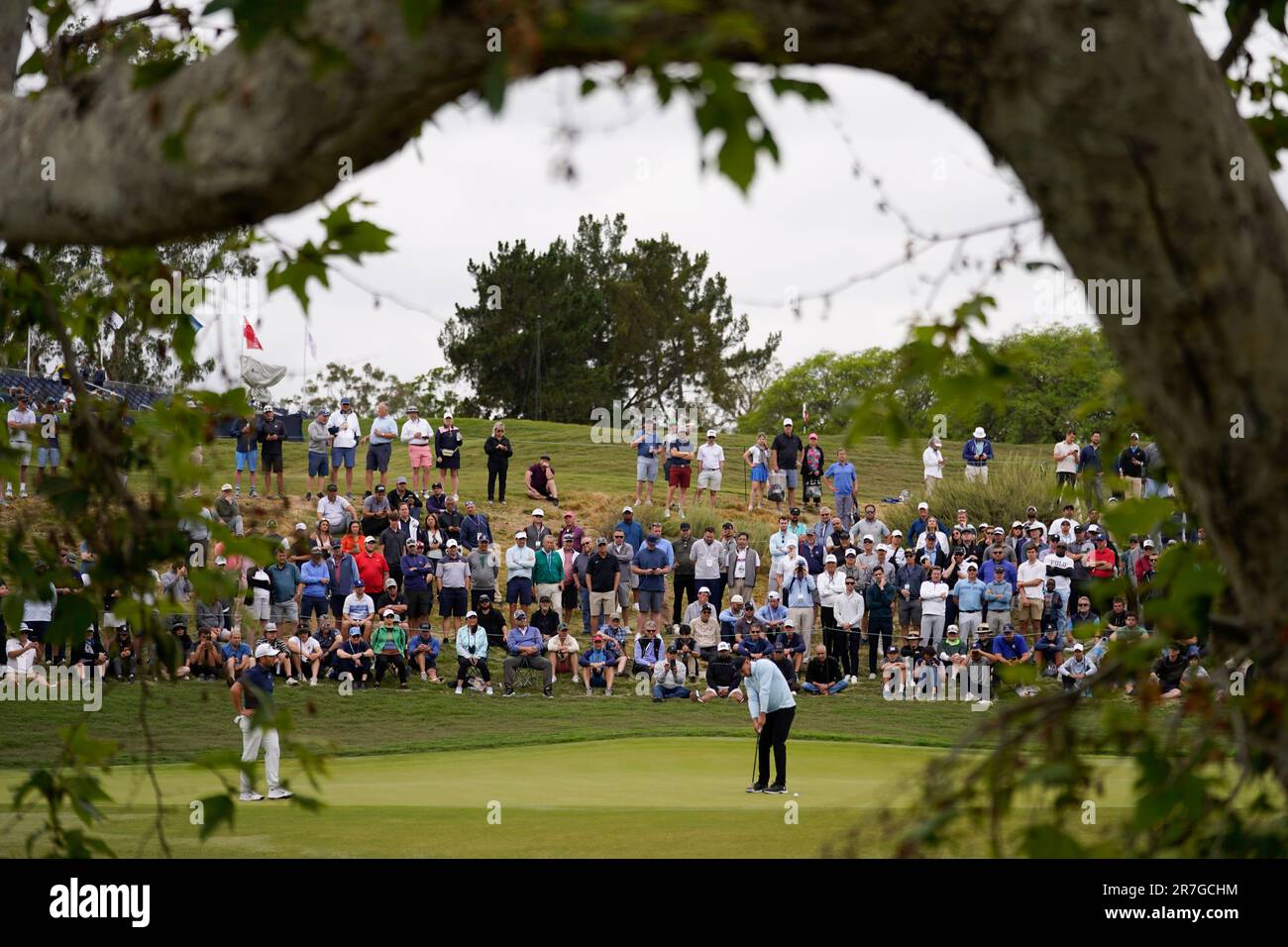 Bryson DeChambeau putts on the third hole during the first round of the ...
