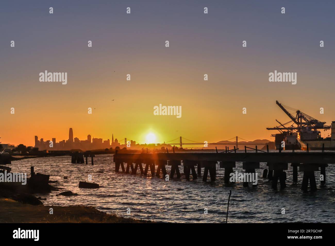 San Francisco Bay, the city and the Bay Bridge at sunset as seen from ...