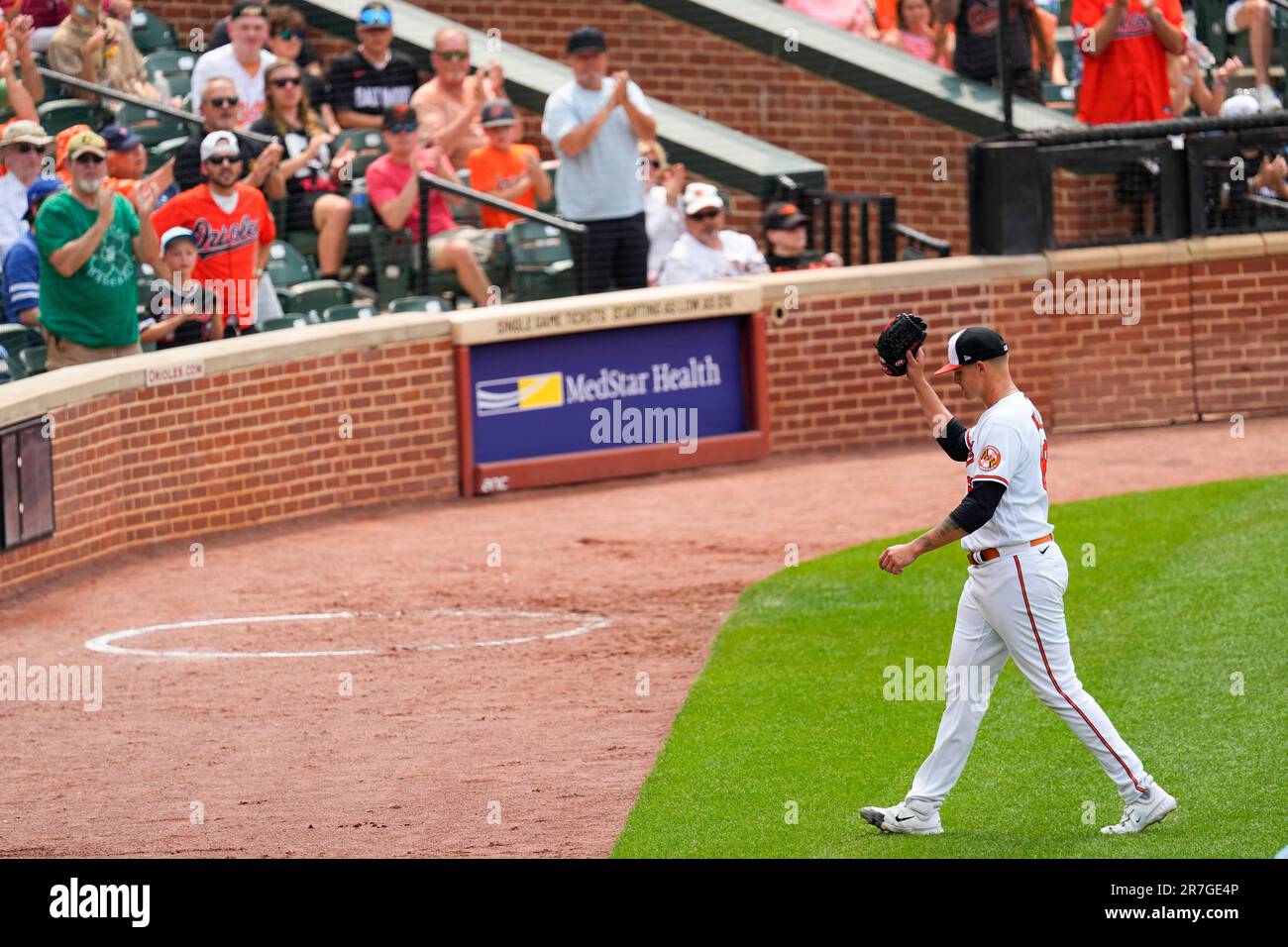 Baltimore Orioles starting pitcher Tyler Wells gestures toward the ...