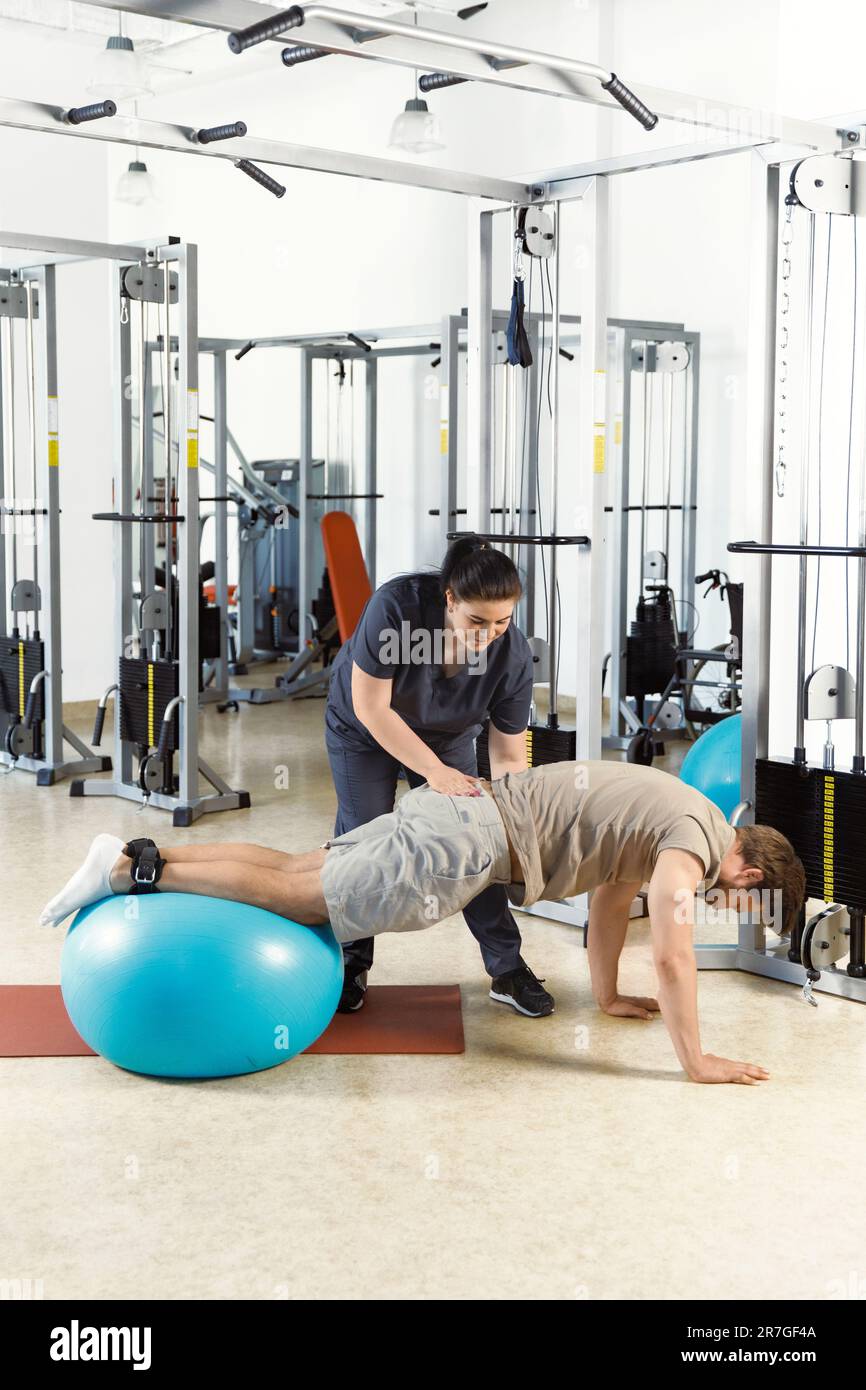 Physical rehabilitation, back strengthening, doing exercises, Health ...