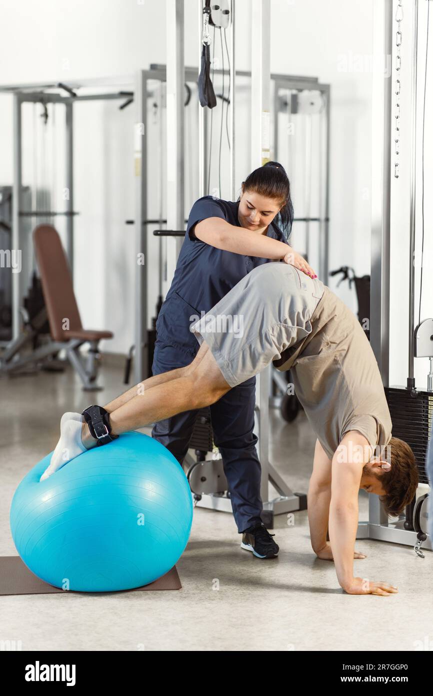 Physical rehabilitation, back strengthening, doing exercises, Health ...