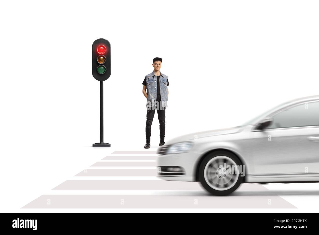 Full length portrait of a gen z guy waiting to cross a street isolated ...