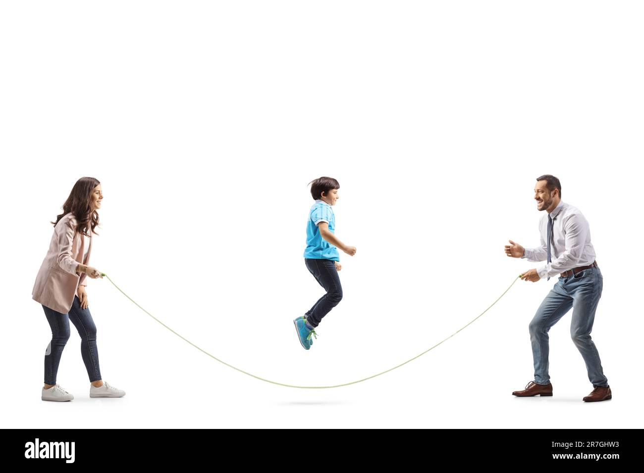 Mother and father playing skipping rope with son isolated on white ...