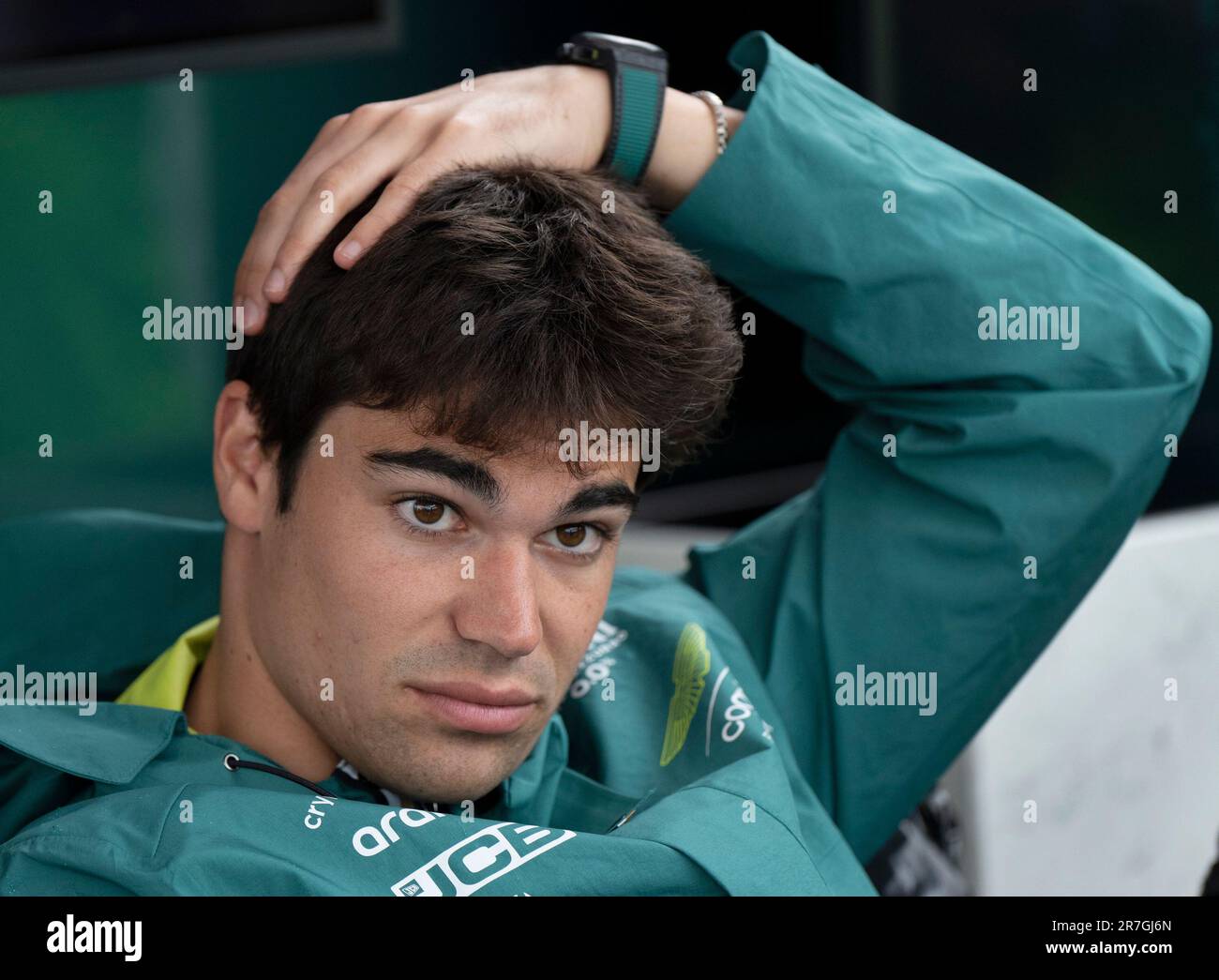Aston Martin driver Lance Stroll, from Canada, waits to speak to the ...