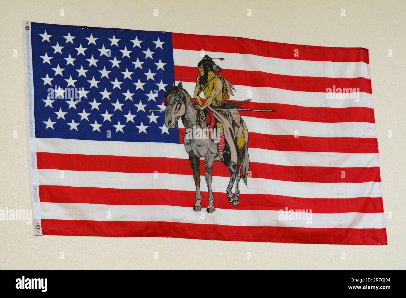 A painting depicting a Native American man galloping on a horse on a US ...