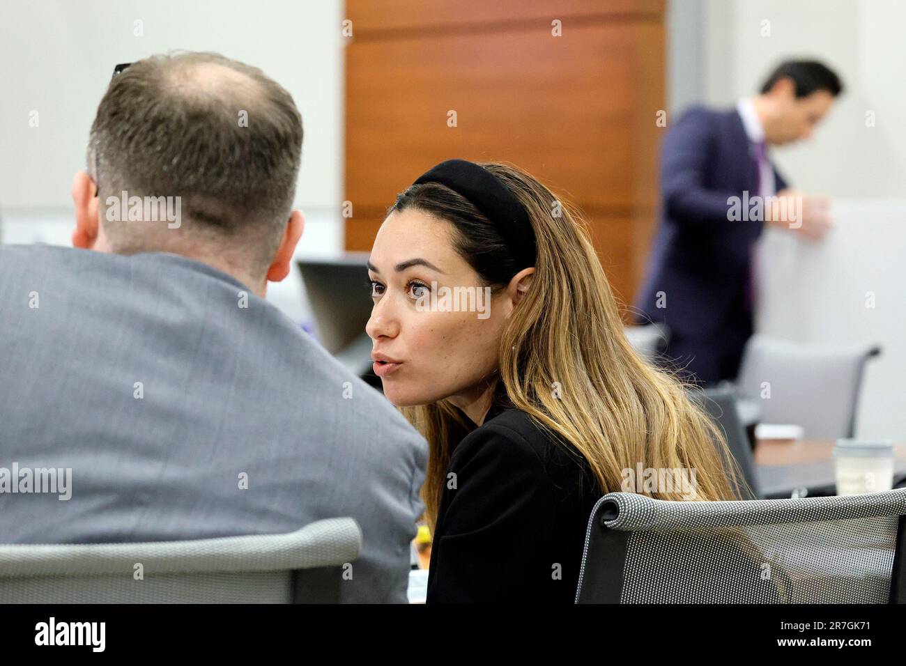 Assistant State Attorneys Kristen Gomes and Christopher Killoran confer ...