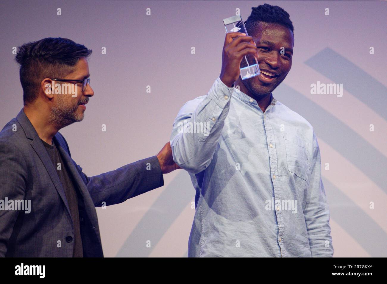 Cologne, Germany. 15th June, 2023. Steve Hiobi (r) and laudator Hasnain ...