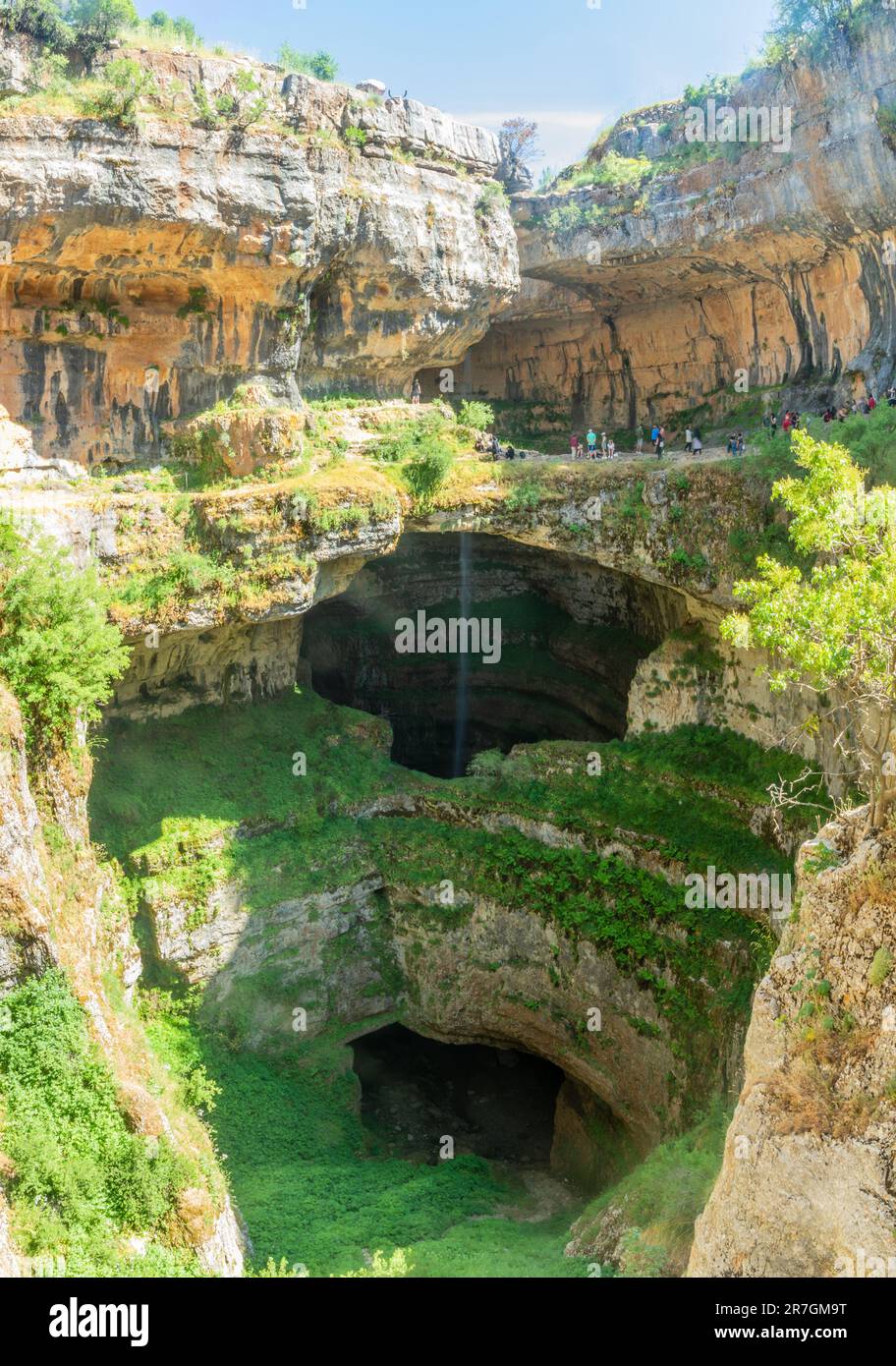 The green Baatara gorge sinkhole or the Cave of the Three Bridges with ...
