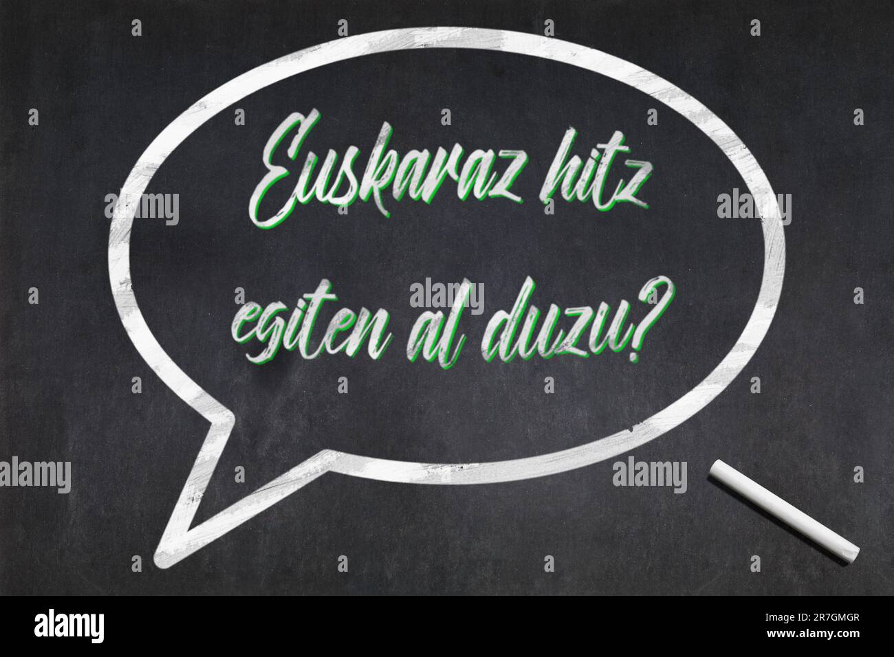 Blackboard with a bubble drawn in the middle with the short phrase in ...