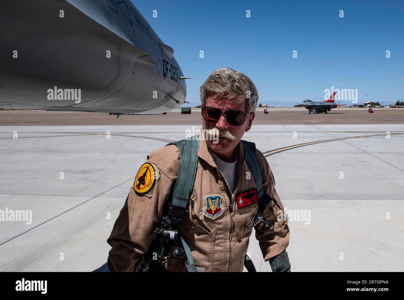 Jim Schreiner, Civilian QF-16 pilot/controller, preflights a QF-16 ...