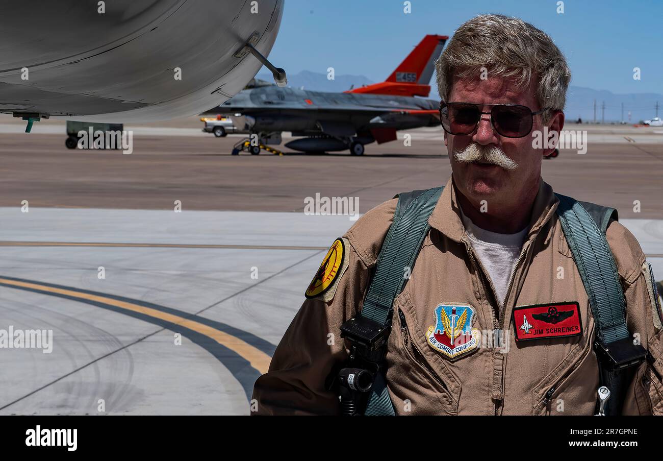 Jim Schreiner, Civilian QF-16 pilot/controller, preflights a QF-16 ...