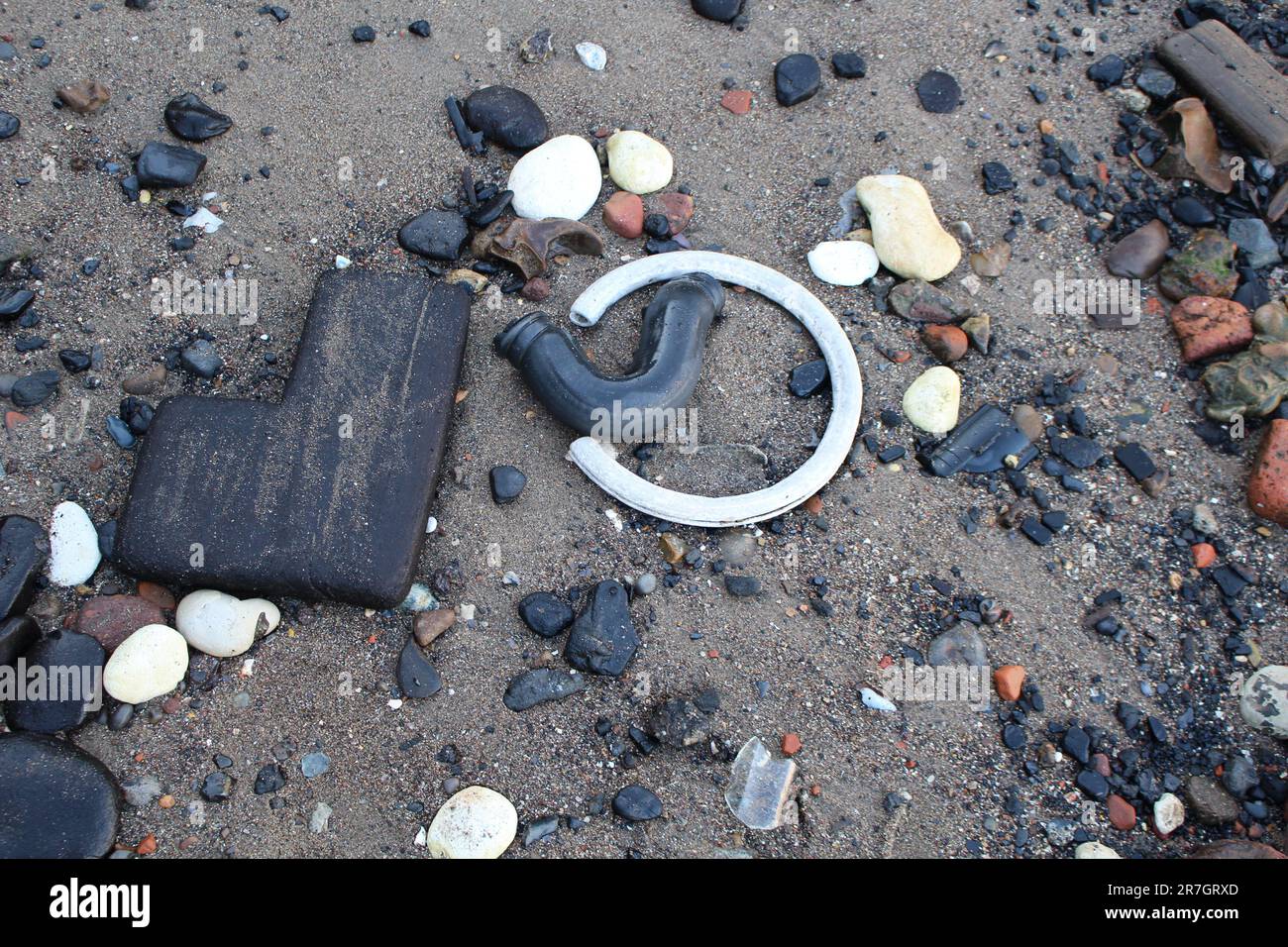 Pollution washed assure onto the beach - environmental harm to wildlife ...