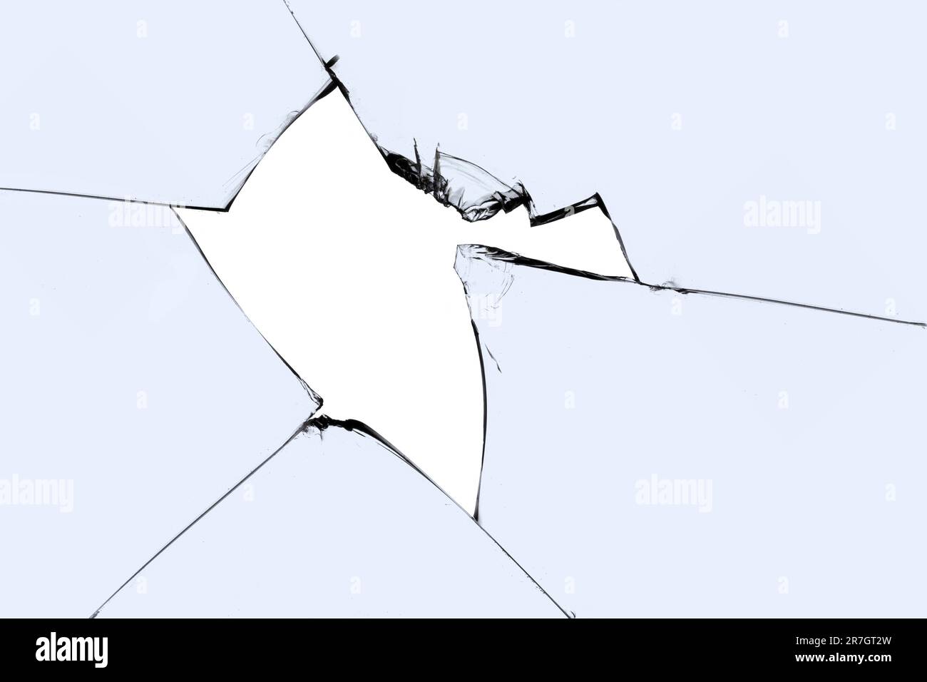 A broken window with cracks and pieces of sharp glass. Cracked texture ...