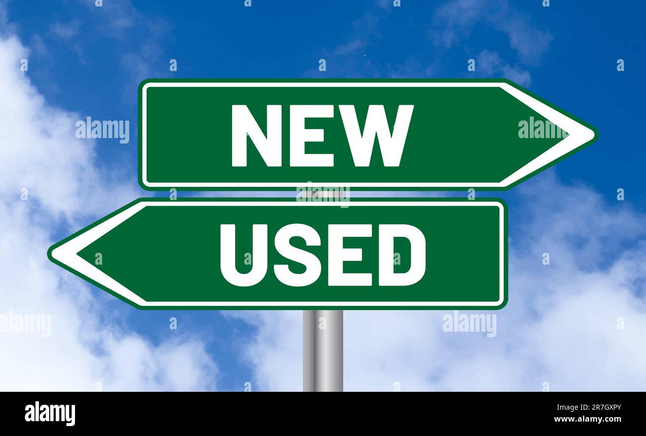 New or used road sign on cloudy sky background Stock Photo - Alamy