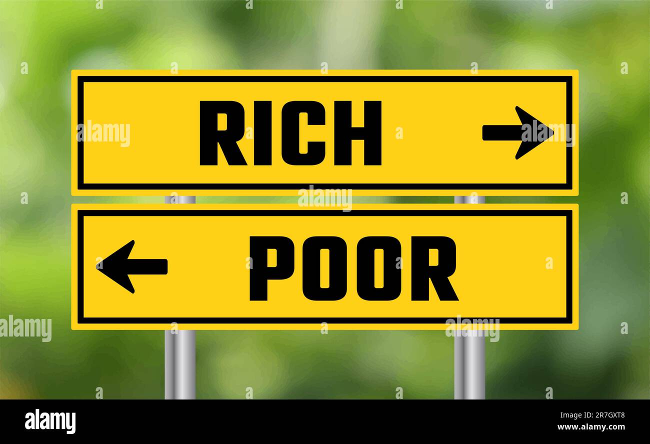 Rich or poor road sign on blur background Stock Photo - Alamy