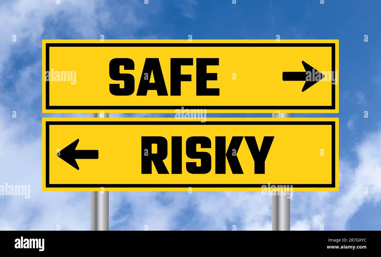 Safe or risky road sign on cloudy sky background Stock Photo - Alamy