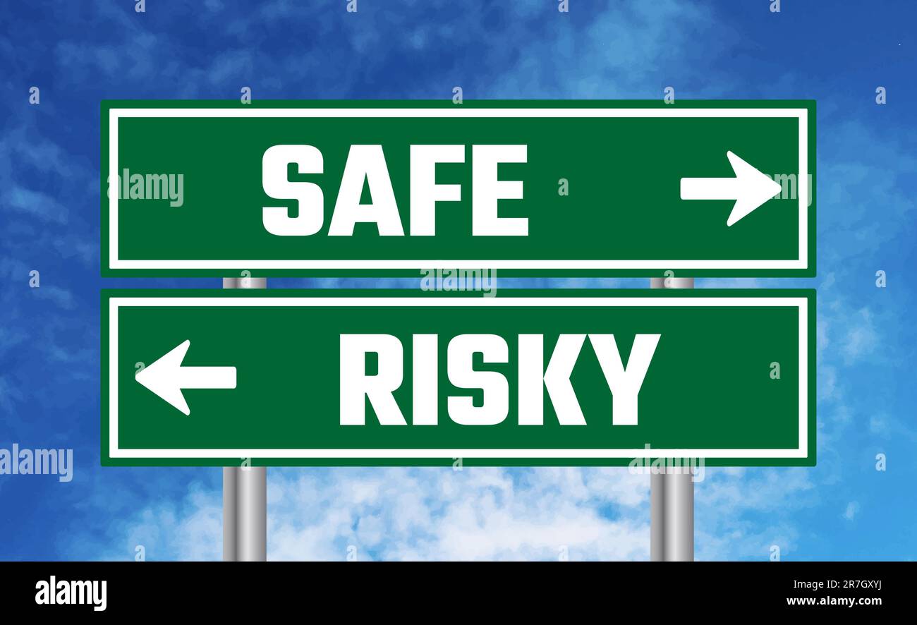 Safe or risky road sign on cloudy sky background Stock Photo - Alamy