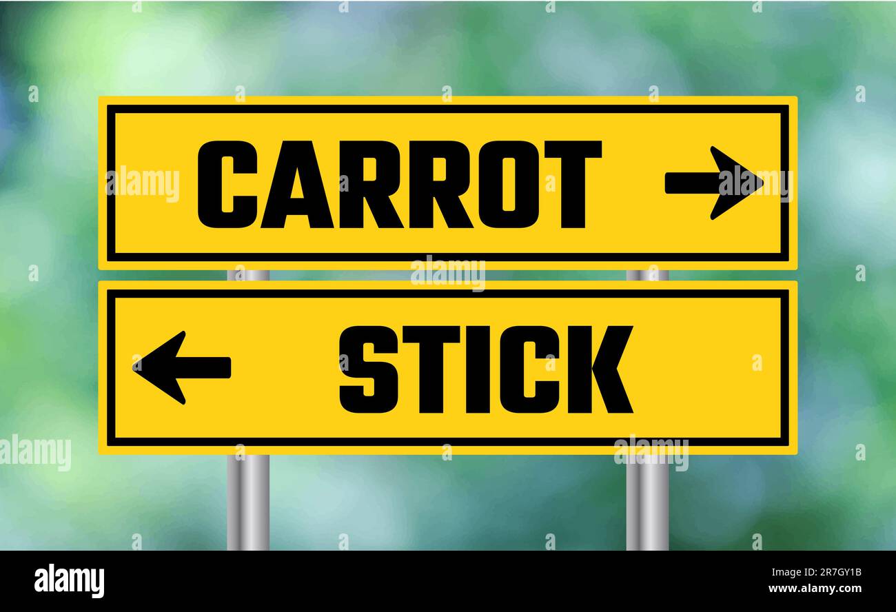 Carrot or stick road sign on blur background Stock Photo - Alamy