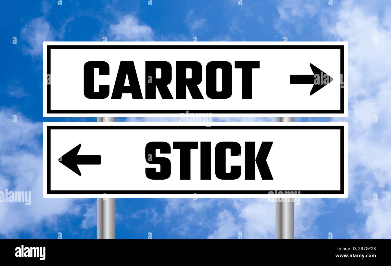 Carrot or stick road sign on cloudy sky background Stock Photo - Alamy