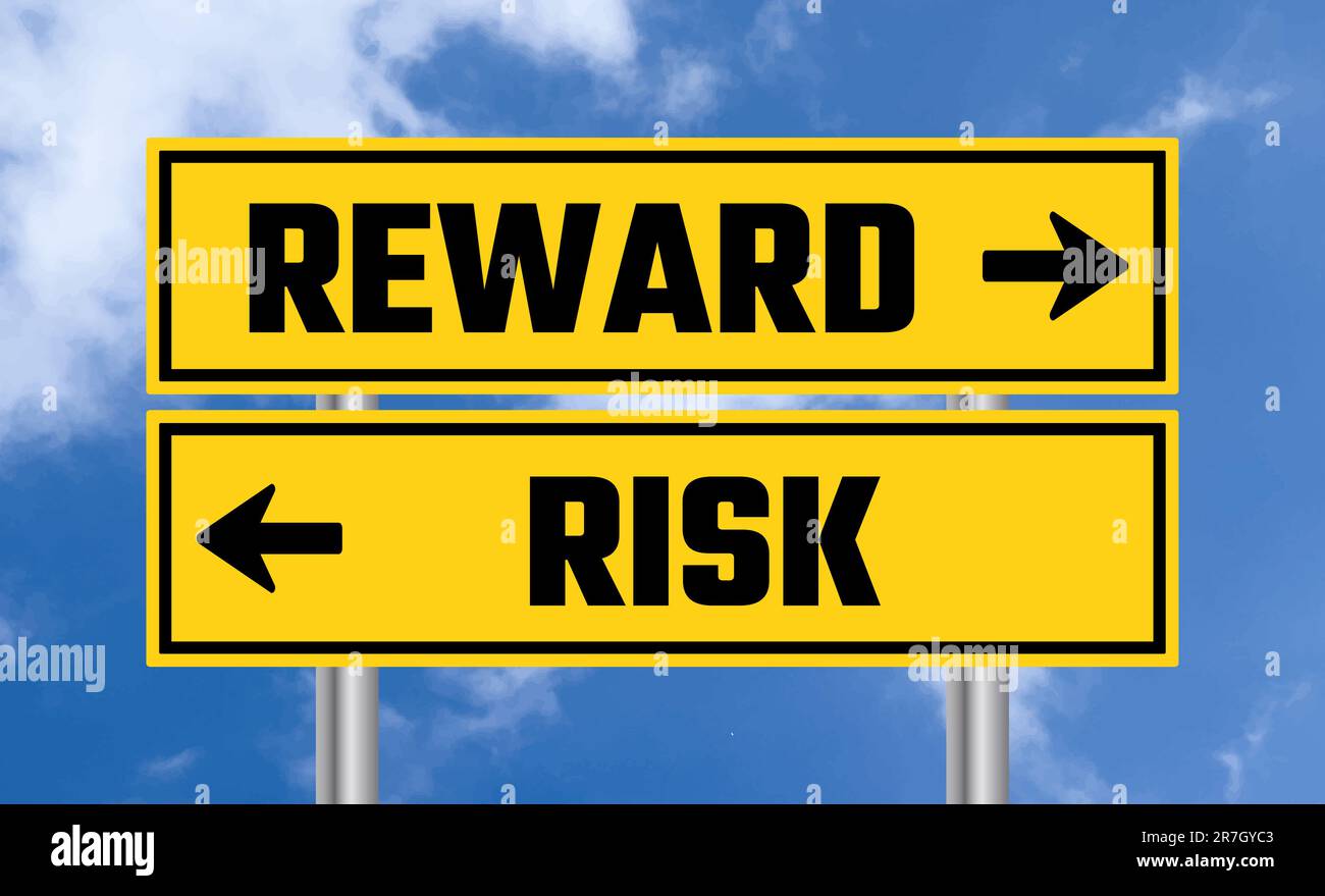 Reward or risk road sign on sky background Stock Photo - Alamy