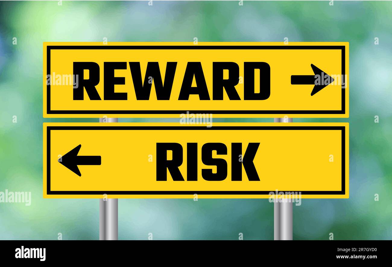 Reward or risk road sign on blur background Stock Photo - Alamy