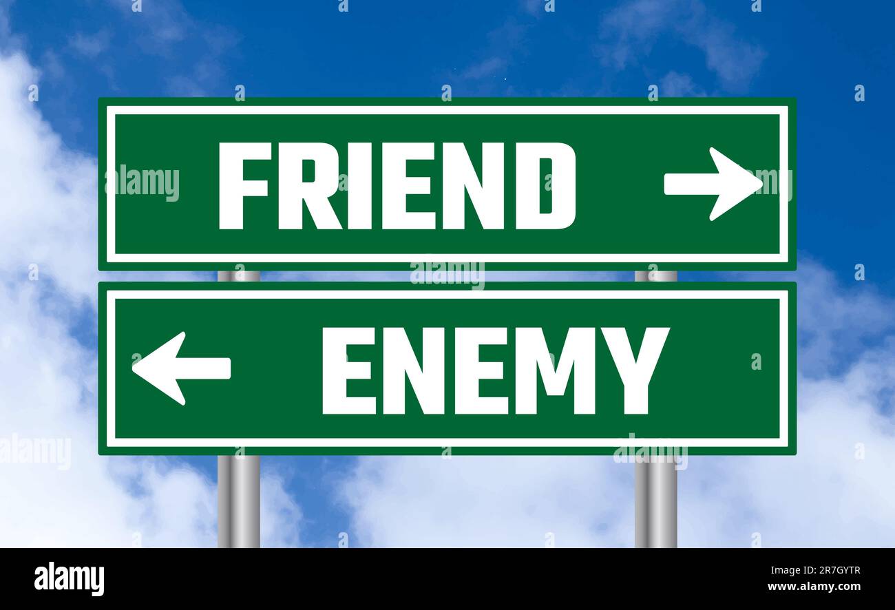Friend or enemy road sign on sky background Stock Photo - Alamy