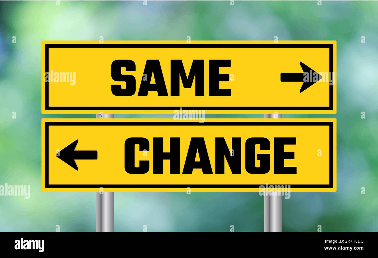 Same or change road sign on blur background Stock Photo - Alamy