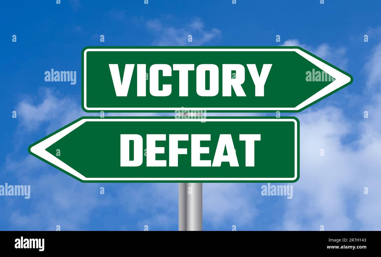 Victory or defeat road sign on sky background Stock Photo - Alamy