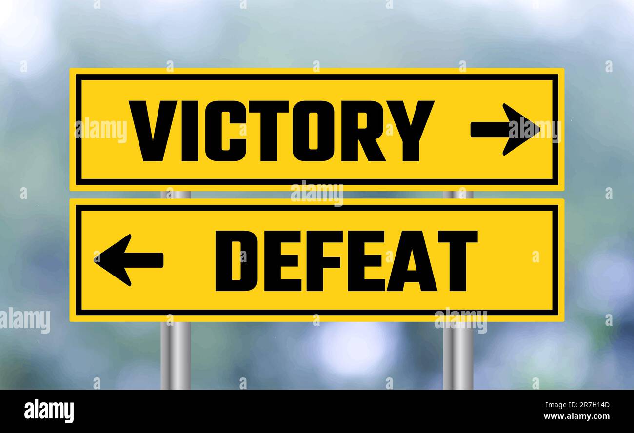 Victory or defeat road sign on blur background Stock Photo - Alamy