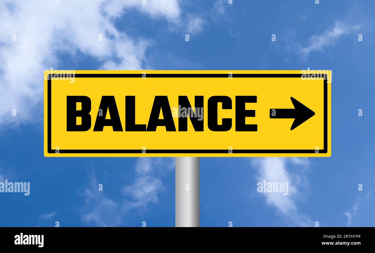 Balance road sign on sky background Stock Photo - Alamy