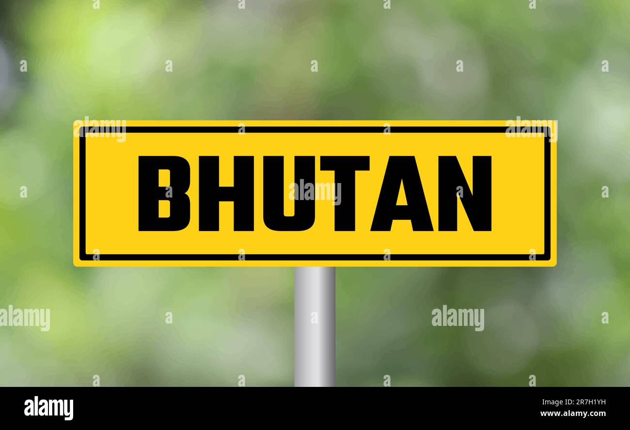 Bhutan road sign on blur background Stock Photo - Alamy