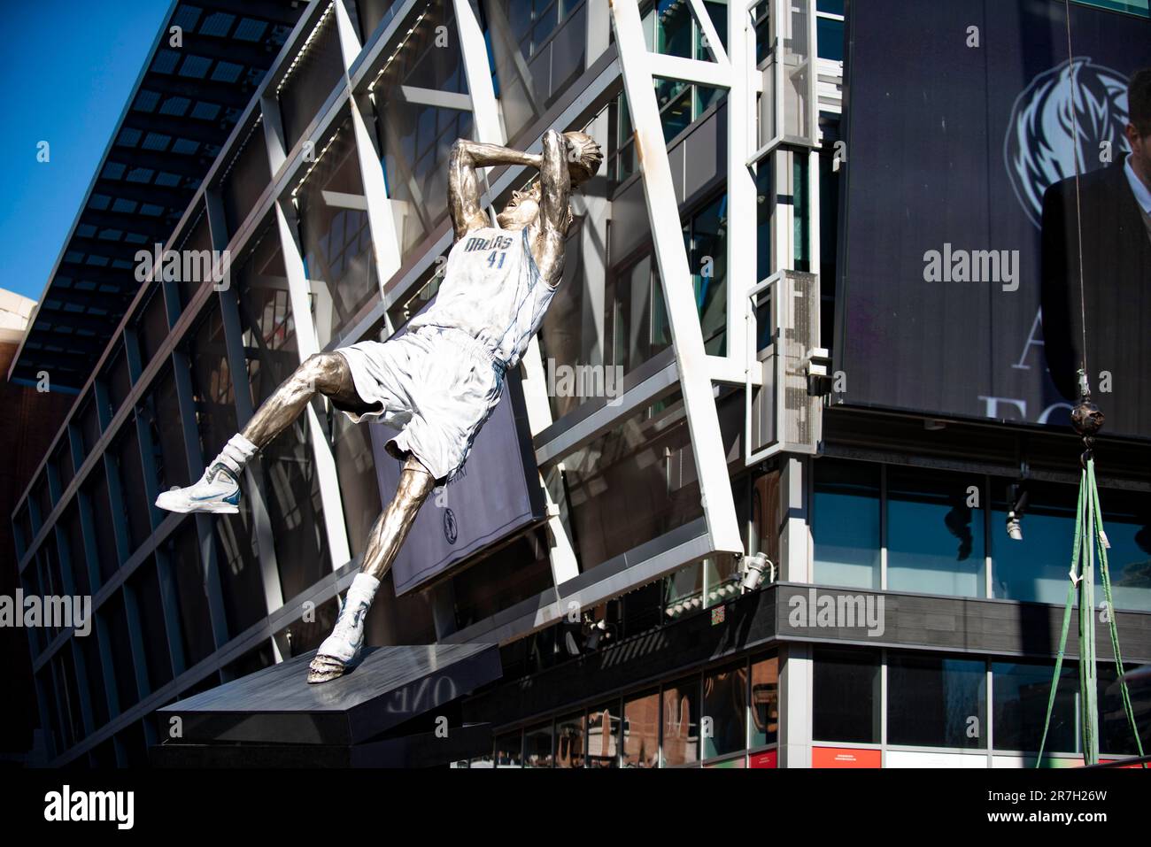 A statue of Dirk Nowitzki is revealed during the "All Four One" statue ...