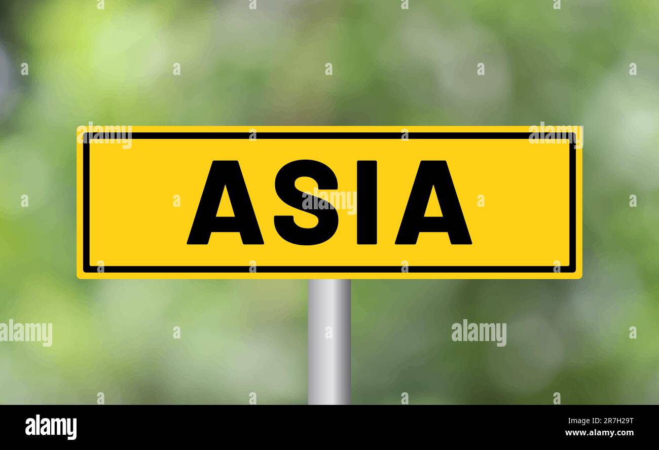 Asia road sign on blur background Stock Photo - Alamy
