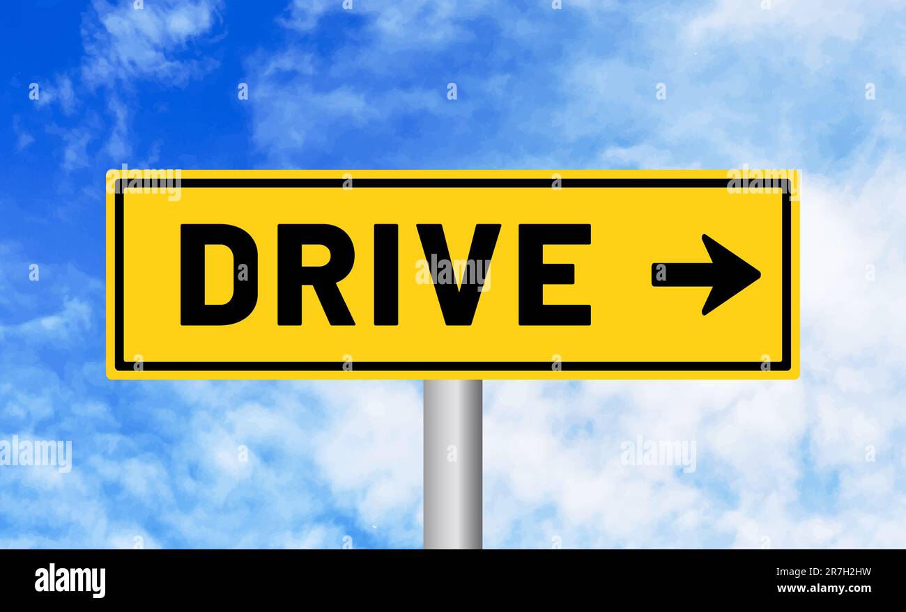 Drive road sign on sky background Stock Photo - Alamy