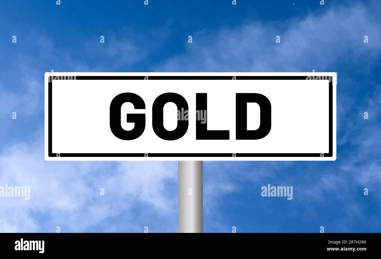 Gold road sign on sky background Stock Photo - Alamy