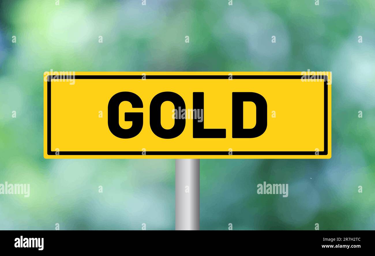 Gold road sign on blur background Stock Photo - Alamy