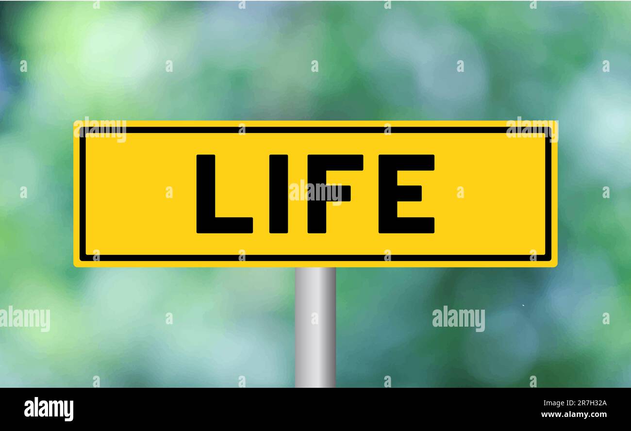 Life road sign on blur background Stock Photo - Alamy