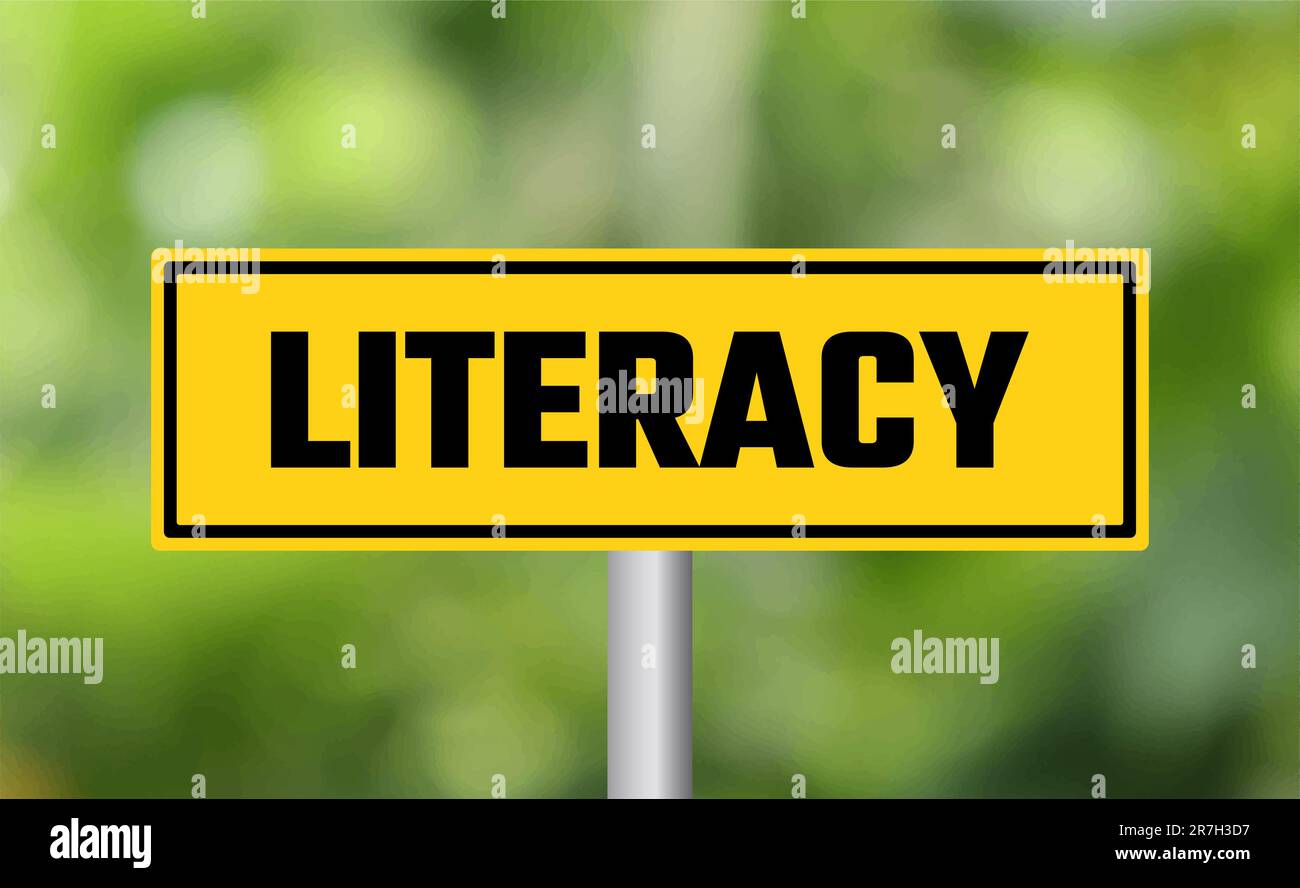 Literacy road sign on blur background Stock Photo - Alamy