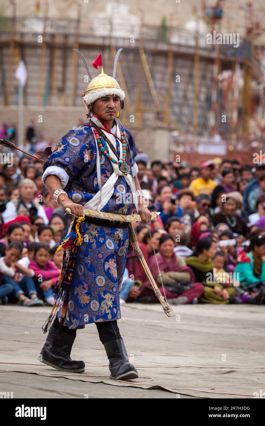 Dancers in traditional Ladakhi Tibetan costumes perform warlike Stock ...