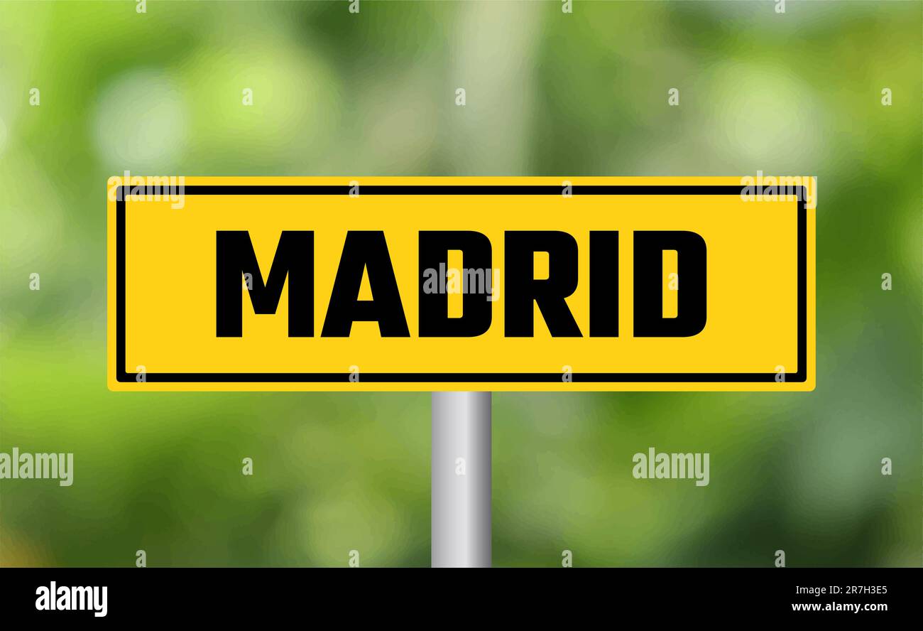 Madrid road sign on blur background Stock Photo - Alamy