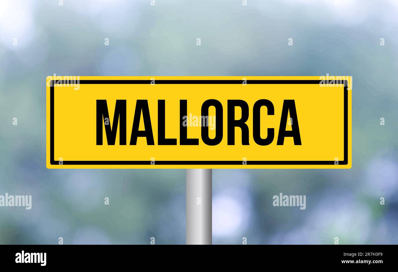 Mallorca road sign on blur background Stock Photo - Alamy