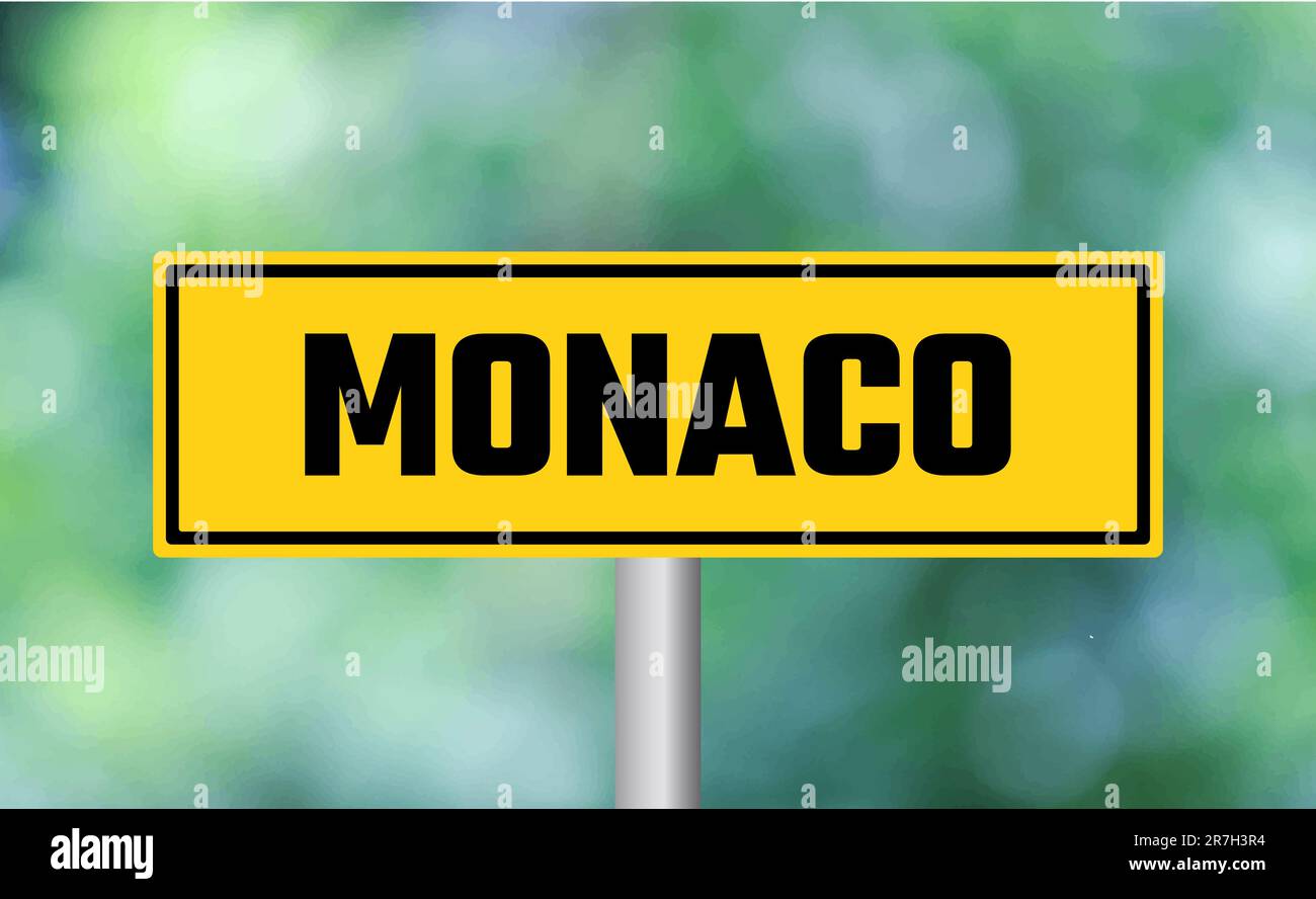 Monaco road sign on blur background Stock Photo - Alamy