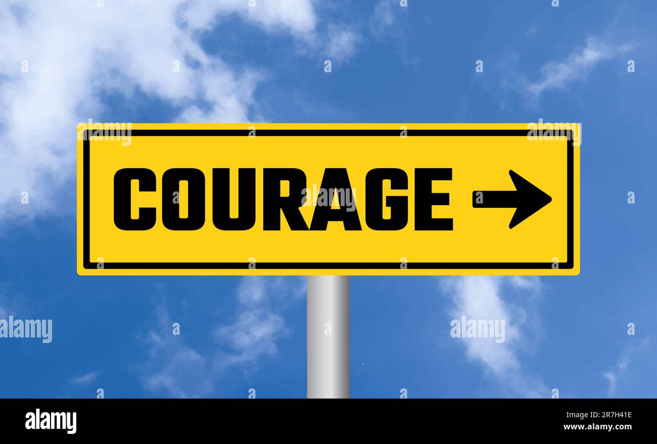 Courage road sign on blue sky background Stock Photo - Alamy